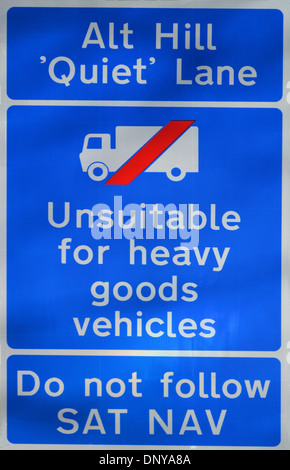 Traffic signs prohibited to heavy vehicles with yellow detour indicator ...