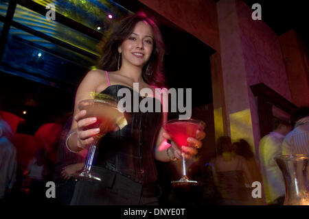 Jan 28, 2006; Hollywood, CA, USA; Scantily clad women dance in glass ...