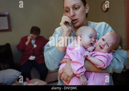 Feb 01, 2006; Fargo, ND, USA; (Left to right) Abbigail Carlsen sleeps ...