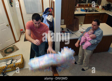 Feb 01, 2006; Fargo, ND, USA; (Left to right) Abbigail Carlsen sleeps ...