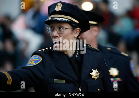 San Francisco Police Chief Heather Fong walks to a news conference past ...