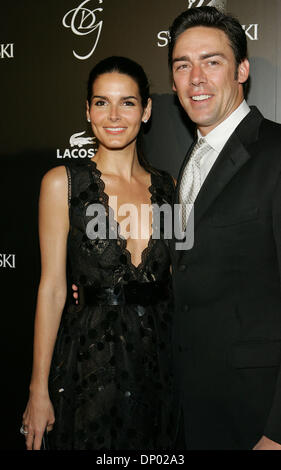 Angie Harmon and husband Jason Seahorn arriving for the 2010 Vanity ...