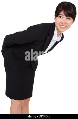 Smiling businesswoman bending Stock Photo - Alamy