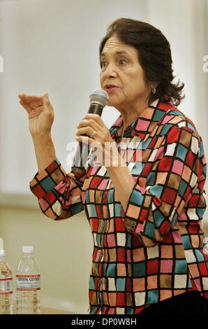 Dolores Huerta, co-founder of United Farm Workers, foreground, speaks ...