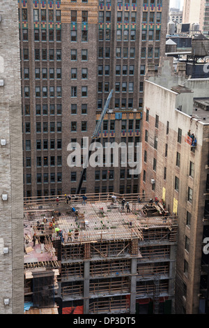 High-rise Building Construction Sitewith tradesmen, NYC, USA Stock ...