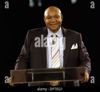Former heavyweight champion George Foreman, left, and Charlie Hostetter ...