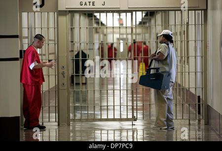Nov 23, 2006; Florence, AZ, USA; A guard speaks with an inmate in the ...