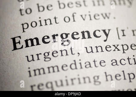 Fake Dictionary, definition of the word emergency Stock Photo - Alamy