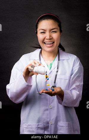 asian female doctor shooting in studio Stock Photo - Alamy