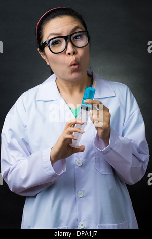 asian female doctor shooting in studio Stock Photo - Alamy