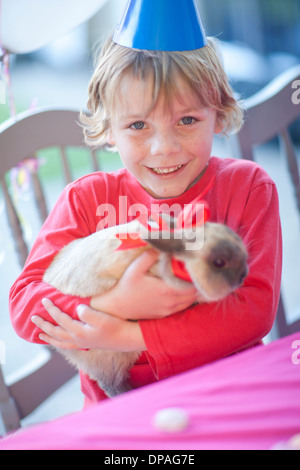 Young Boy Holding His Pet Rabbit; Portland, Oregon, Usa Stock Photo - Alamy