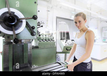 Technician working in optical laboratory Stock Photo - Alamy