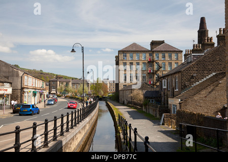 The Huddersfield Narrow Canal and old Mill building at Slaithwaite in ...