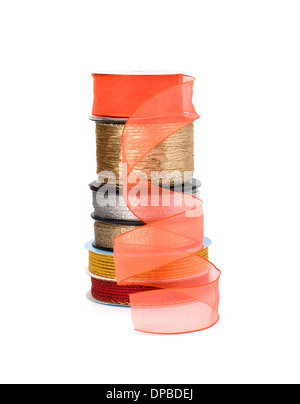 Festive ribbons stack isolated on white background Stock Photo - Alamy