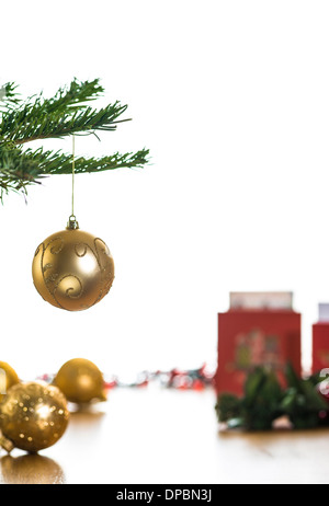 Bright Red Ornament Hanging From a Festive Christmas Tree Surrounded by ...
