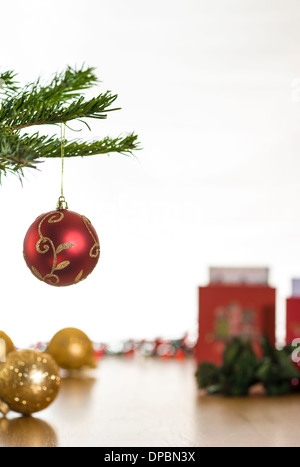 Christmas baubles and decorations hanging on the tree Stock Photo - Alamy