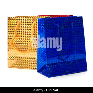 shiny paper gift bags isolated on white background Stock Photo - Alamy