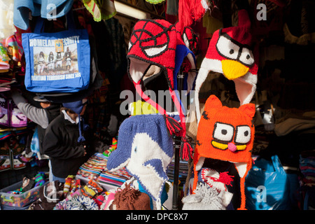 Various character trapper hats on display Stock Photo - Alamy