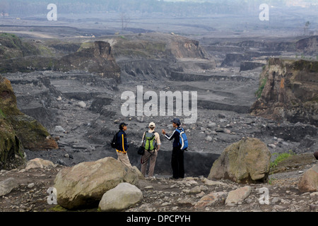Damage to village from Pyroclastic flow of Mt Merapi eruption smoking ...