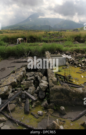 Damage to village from Pyroclastic flow of Mt Merapi eruption smoking ...