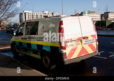 Home Office Immigration Enforcement vans parked outside a building in ...