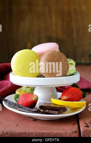 different colorful macaroons (pistachio, raspberry, chocolate, vanilla ...