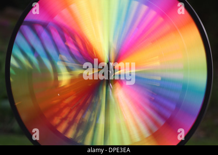 Colorful wind wheel in garden Stock Photo - Alamy