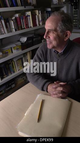 David Phillips, sociologist professor at UCSD, looks for charts in his ...