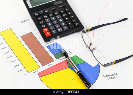 Financial accounting scene pencil pen calculator chart Stock Photo - Alamy