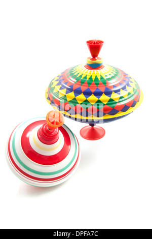 colorful metal spinner on a white background Stock Photo - Alamy
