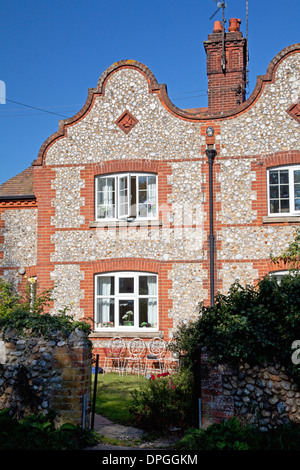 Flint and brick cottages with Flemish gables, Glandford, Norfolk Stock ...