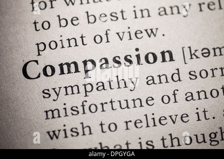 Fake Dictionary, definition of the word compassion Stock Photo - Alamy