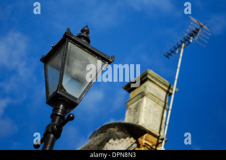 Lamp post with blue sky behind Stock Photo - Alamy