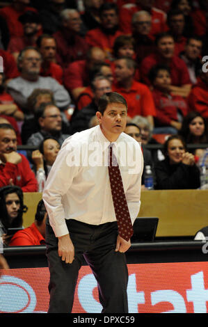 UNLV head coach Dave Rice points toward the scoreboard during an NCAA ...