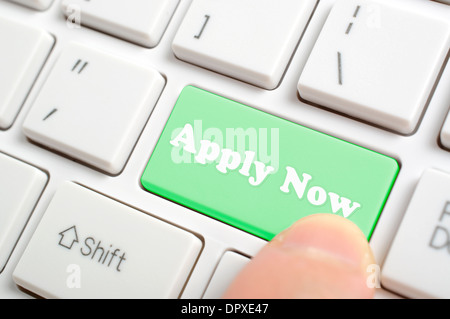 apply now green button on keyboard, business concept Stock Photo - Alamy
