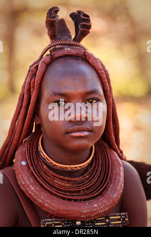 Namibia. Native Himba woman poses in her traditional style of dress and ...