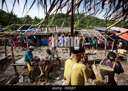 Hanunoo Mangyans at a Mangyan market near Mansalay, Oriental Mindoro ...