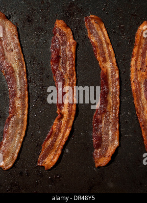 Fried bacon, bacon strips in frying pan, breakfast bacon Stock Photo ...