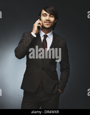 Young handsome business man over isolated background looking stressed ...