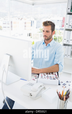 Young hispanic artist man concentrated painting at art studio Stock ...