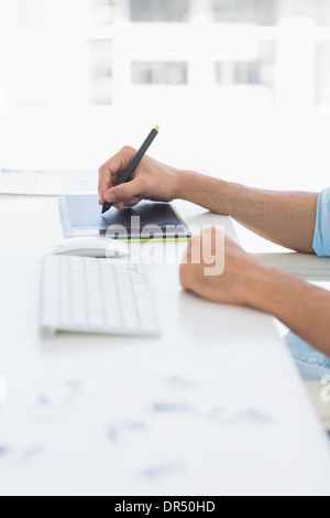 Close up photo of male hands holding red brick. Construction site ...