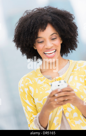 African American using cell phone Stock Photo - Alamy