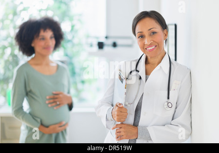 African american woman doctor smiling confident holding medical report ...