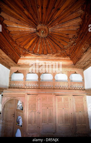 Interior of a traditional Turkish house with wood capped fire place ...