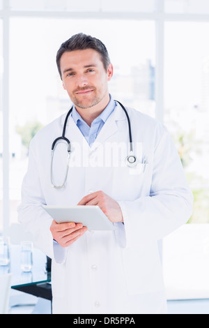 male doctor a with tablet pc at the hospital Stock Photo - Alamy