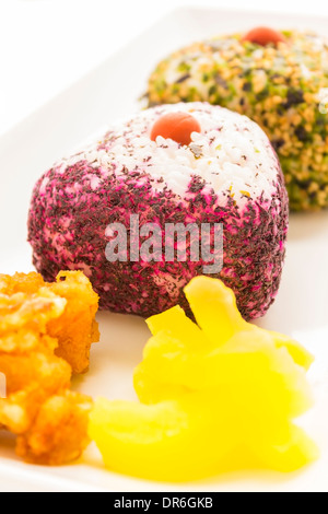 Common Hawaiian food, ume rice musubi, one with yukari and one with ...