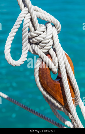 Wooden deadeyes with rope on a sailing vessel Stock Photo - Alamy