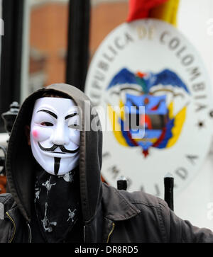 A lone member of the hacktivist group known as 'Anonymous' poses ...