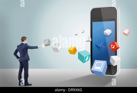 Digital icons and businessman using mobile phone in office. Concept of ...