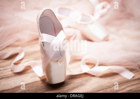 Ballet Shoe on a wooden floor Stock Photo - Alamy